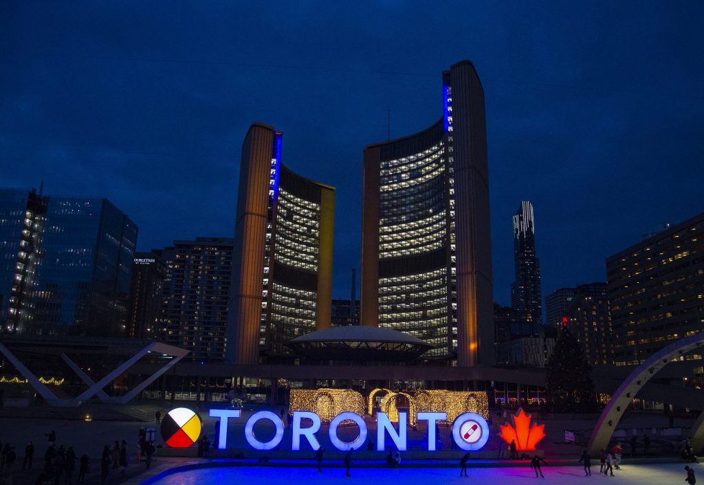 New Team Toronto pink bandage added to Toronto Sign to encourage COVID ...